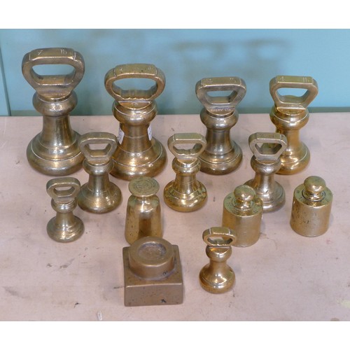 A set of nine graduated brass bell weights, circa 1860s, together with ...