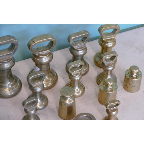 A set of nine graduated brass bell weights, circa 1860s, together with ...