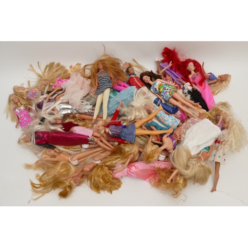 An assortment of forty one fashion dolls, including Mattel Barbie ...