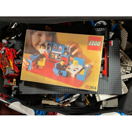 A substantial quantity of loose lego pieces.