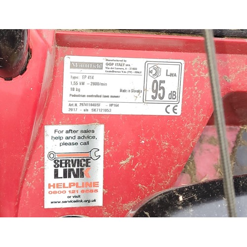 A Mountfield RS100 petrol driven lawn mower with grass box.