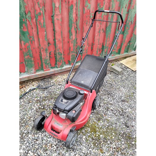 A Mountfield RS100 petrol driven lawn mower with grass box.