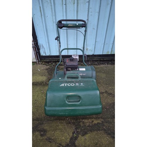 An Atco Balmoral 20SK cylinder lawn mower, having petrol driven ...