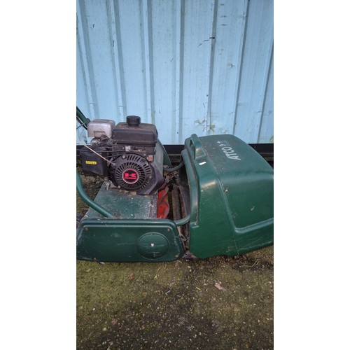 An Atco Balmoral 20SK cylinder lawn mower, having petrol driven ...