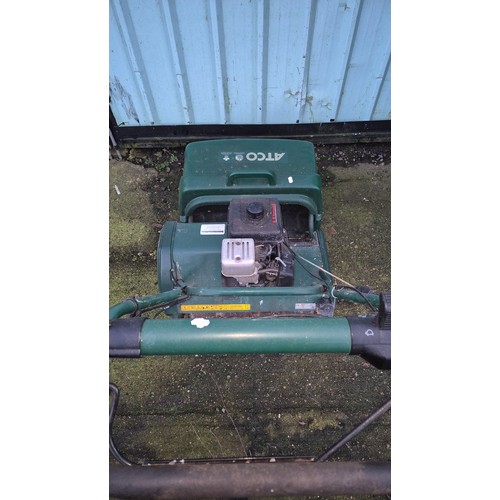 An Atco Balmoral 20SK cylinder lawn mower, having petrol driven ...