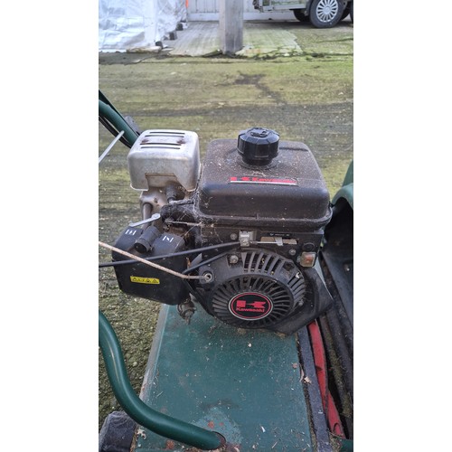 An Atco Balmoral 20SK cylinder lawn mower, having petrol driven ...