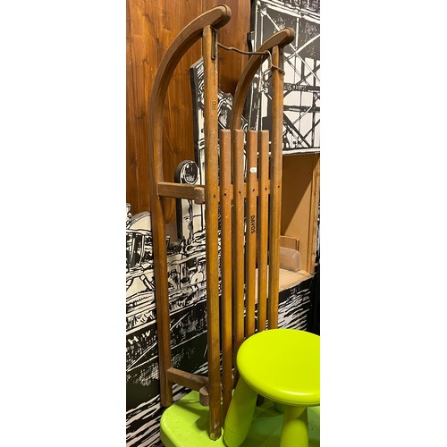 A traditional Davos sledge/toboggan, 110cm, Austrian, together with a ...
