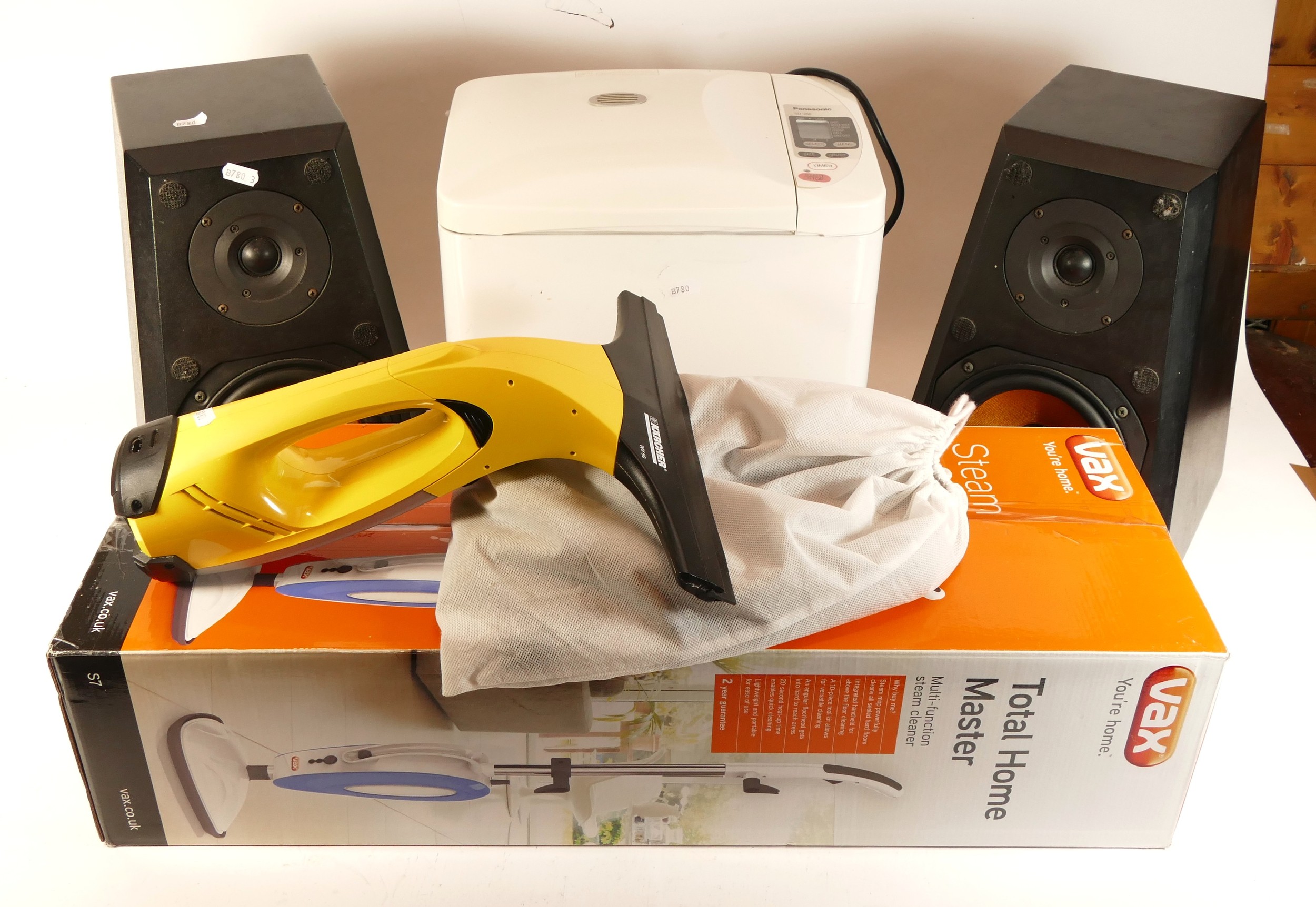 A Karcher handheld steam cleaner, together with a Vax S7 steam cleaner ...