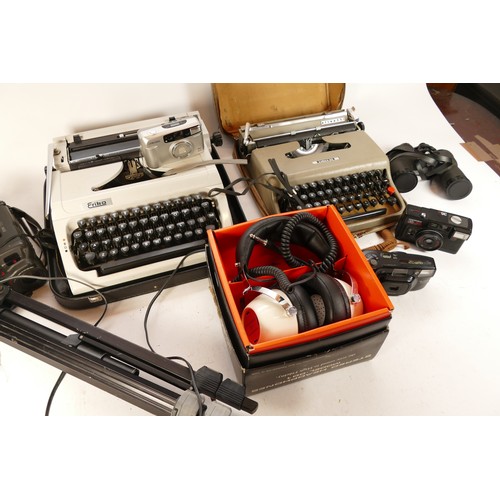 Two mid 20th century portable typewriters, to include an Erika and a ...