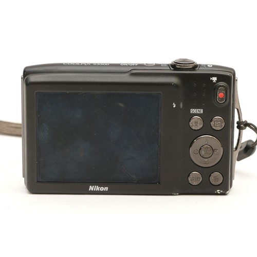 A Nikon Coolpix S3000 compact digital camera, in black with case.