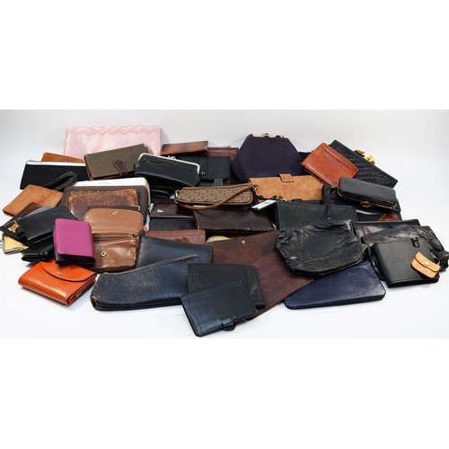 A large collection of ladies purses and gentlemen's wallets, to include ...