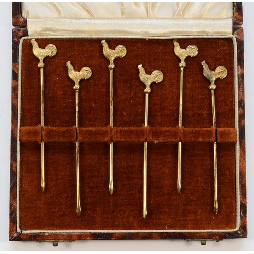 A sterling silver gilt set of six cockerel cocktail sticks, cased, 18gm.