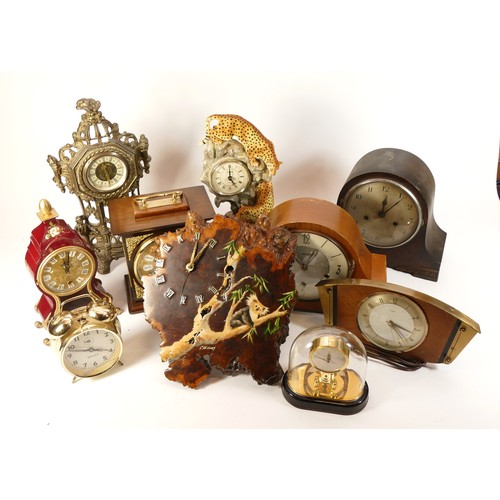 A collection of mid twentieth-century and later mantel clocks, wall and ...