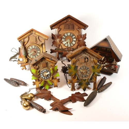 A collection of mid-twentieth century Black Forest cuckoo clocks ...