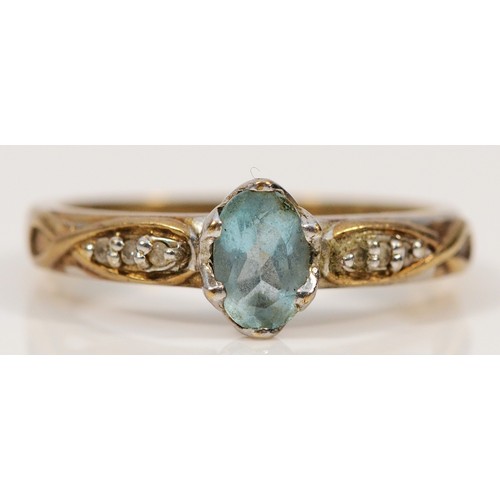 A 9ct gold blue gemstone solitaire ring with diamond set shoulders, M, 2.4g