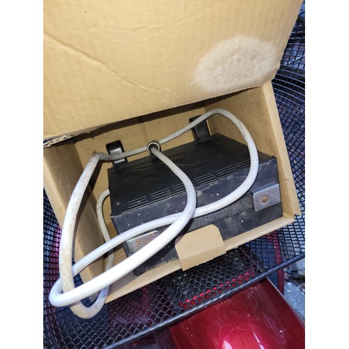 A Strider ST5 four wheeled mobility scooter, with key and charger ...