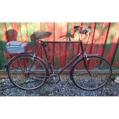 A vintage 1970s gents Raleigh bicycle, having three speed gearing.