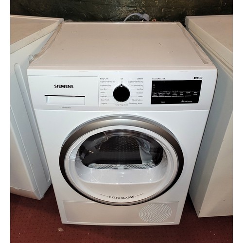 A Siemens IQ500 ExtraKlasse condensing clothes dryer, W59, D57, H84cm.