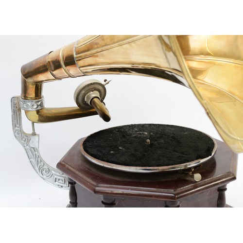 A HMV reproduction wind-up gramophone, the octagonal wooden case with ...