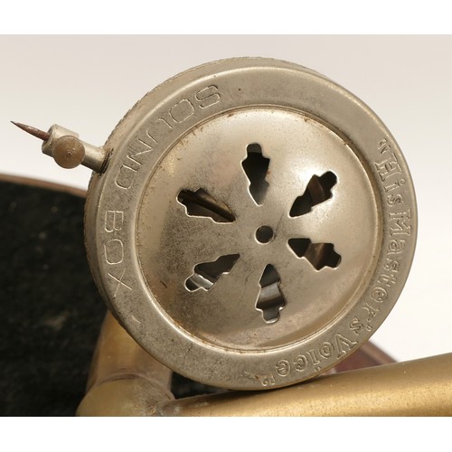 A HMV reproduction wind-up gramophone, the octagonal wooden case with ...