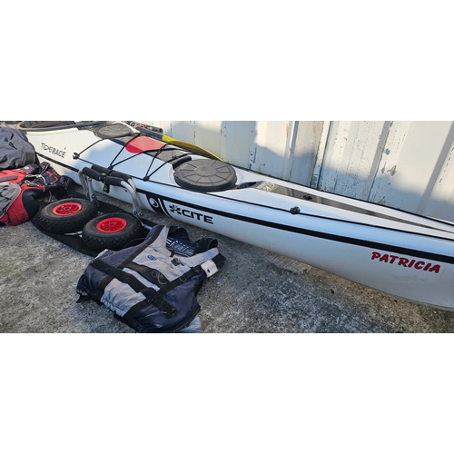 Xcite Tiderace sea kayak, c.2010, 5.4m, with two paddles and other ...