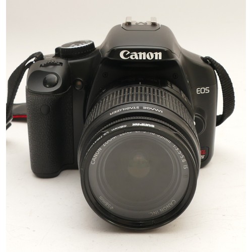 A Canon EOS Rebel XSI digital camera, with a Canon EF-S f/3.5-5.6 18 ...