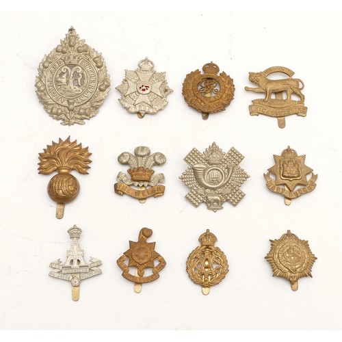 12x Military cap badges, to include the Royal Engineers, The Welsh and ...