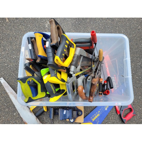 A collection of carpentry saws, hacksaws, junior hacksaws and bowsaws ...