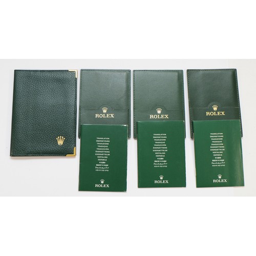 Rolex, green leather wallet and three green card wallets (4)