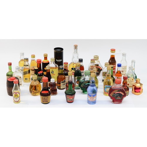 A selection of over thirty miniature bottles of spirits to include ...