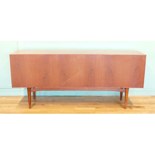 John Herbert for A.Younger Ltd; A mid 20th century teak sideboard credenza, of rectangular form, the