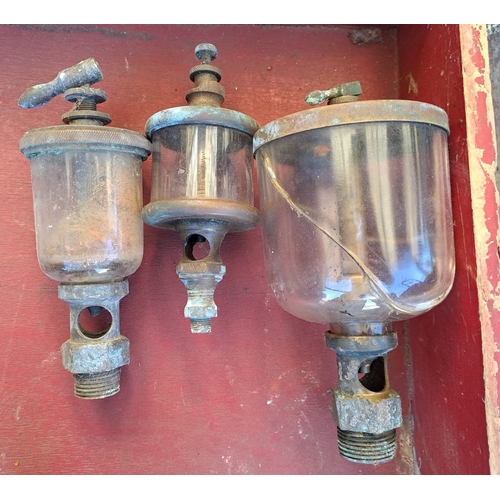 Three stationary engine oilers (3)