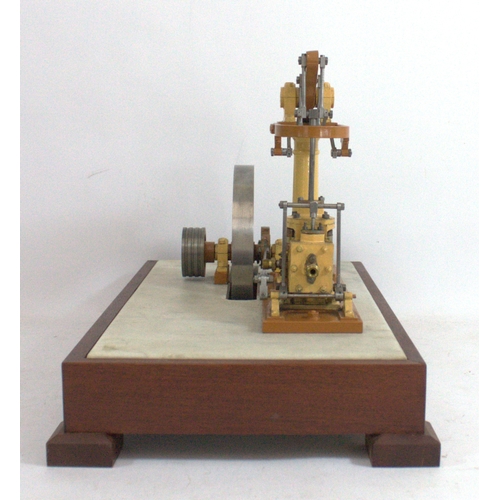 A Stuart Turner single cylinder compressed air beam engine, mounted on ...