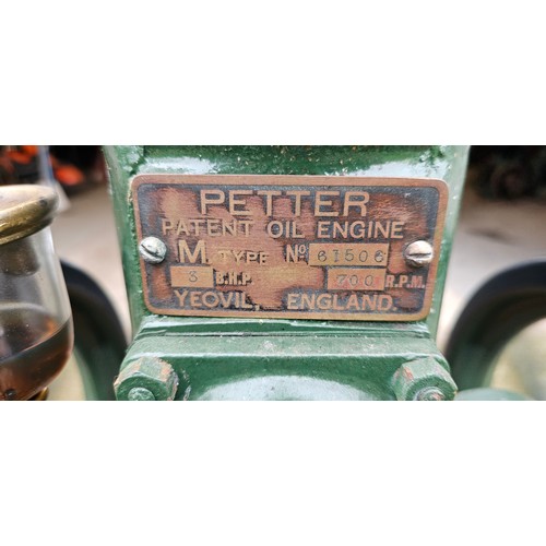 A Petter 3hp M type stationary engine, serial number 61506, mounted on ...