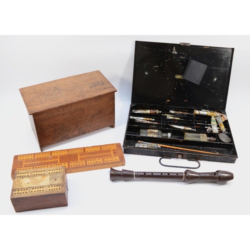 A wooden box, decorated with Pokerwork text, housing a cribbage board ...