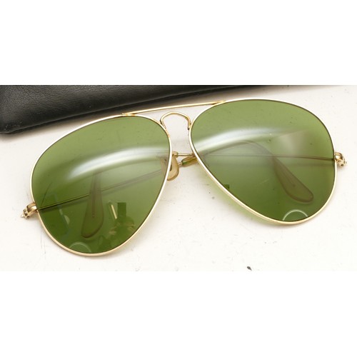 Ray-Ban; Four cased pairs of Ray-Ban designer sunglasses, together with ...