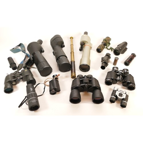 A collection of binoculars and spotting scopes, makers to include ...