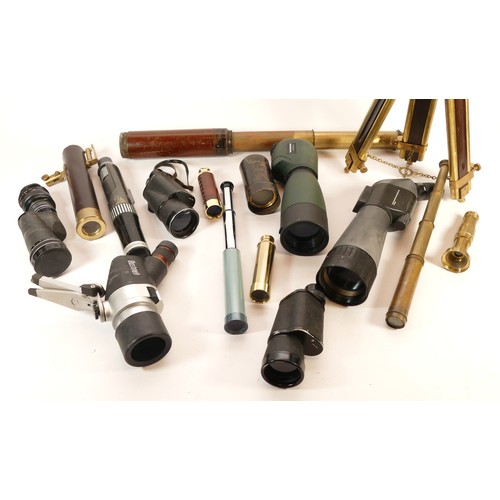 A collection of scopes, makers to include, Greenkat, Bushnell, and Delta.