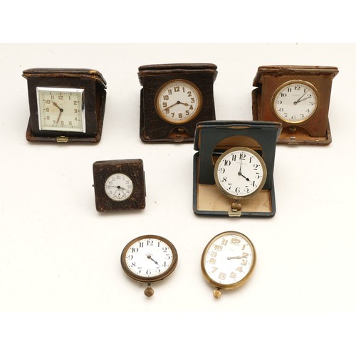 Seven travel and bedside alarm clocks, housing eight day movements, to ...