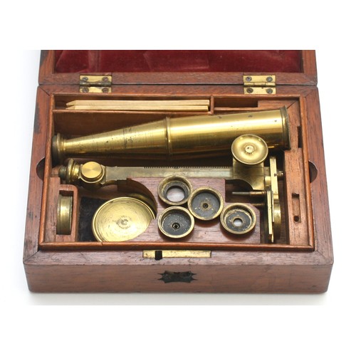 A mid-late nineteenth century brass compound microscope, with two ...