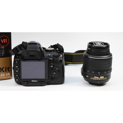 A Nikon D5000 digital camera, with a Nikon f/3.5-5.6 18-55mm lens, boxed.