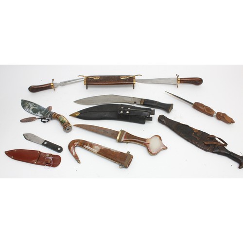 A collection of seven 20th century and later reproduction daggers to ...