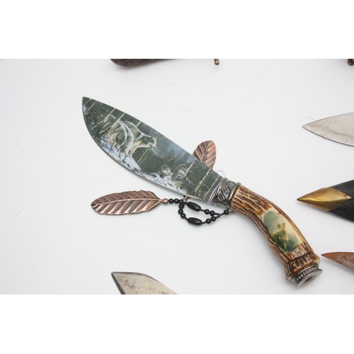 A collection of seven 20th century and later reproduction daggers to ...