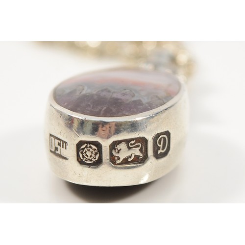 David Scott Walker, a silver double sided gemset pendant on a chain ...