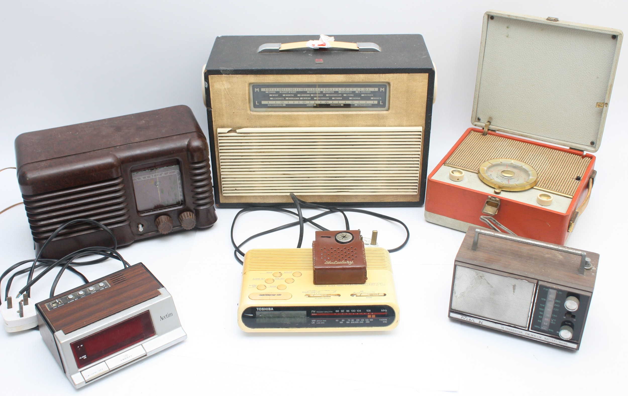 A collection of seven 20th century portable valve and transistor radios ...