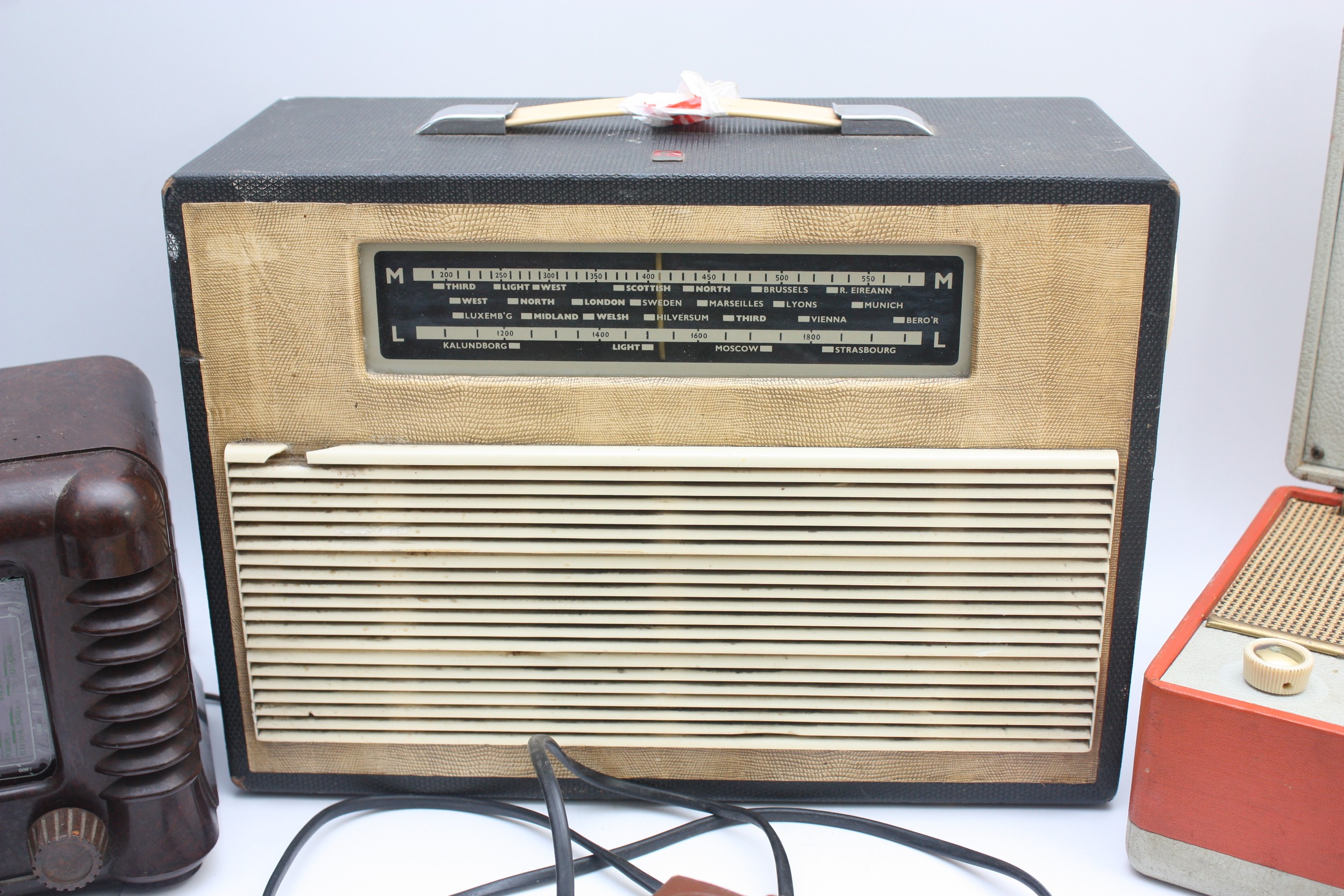 A collection of seven 20th century portable valve and transistor radios ...