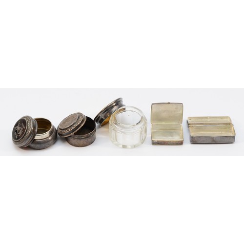 A silver circular pill box, having tortoise shell decoration to the lid ...
