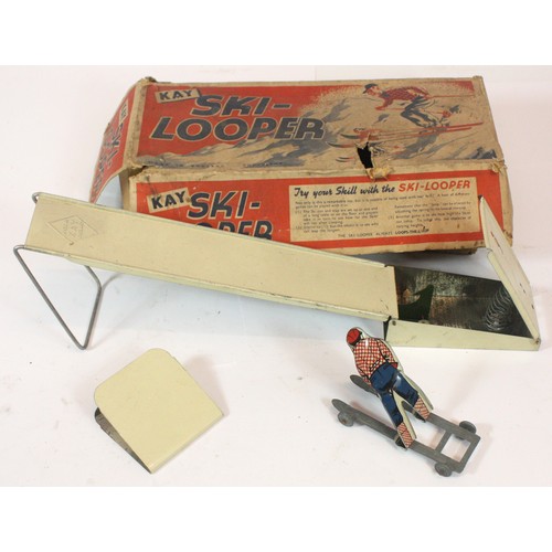 A Russian tin plate model railway set, three Mettoy tin plate clockwork ...
