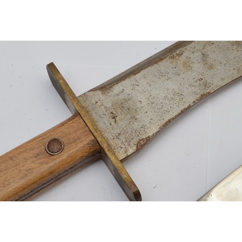 A late 20th century bowie knife, together with a Kukri, with sheaths ...