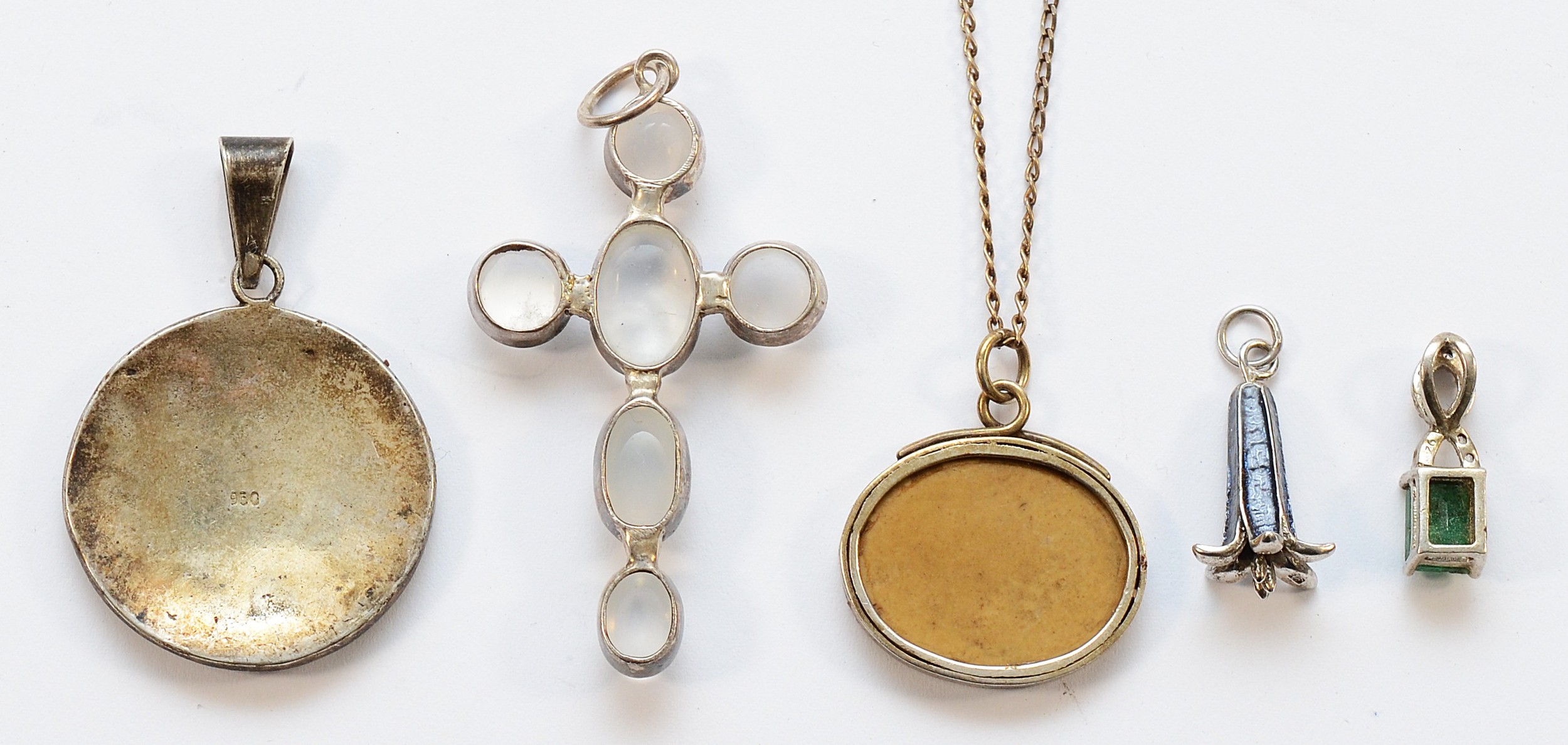 A 950 silver and gemset pendant, 8.5g, two 925 silver pendants, 3.4g, a ...